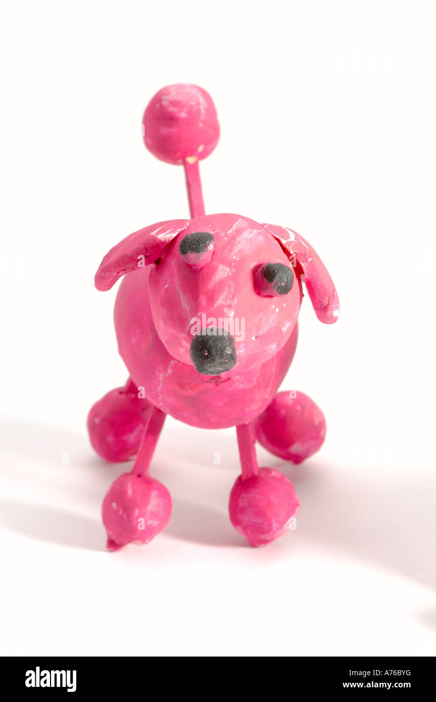 Pink Plasticine dog with matchstick legs: A child's handcrafted ...