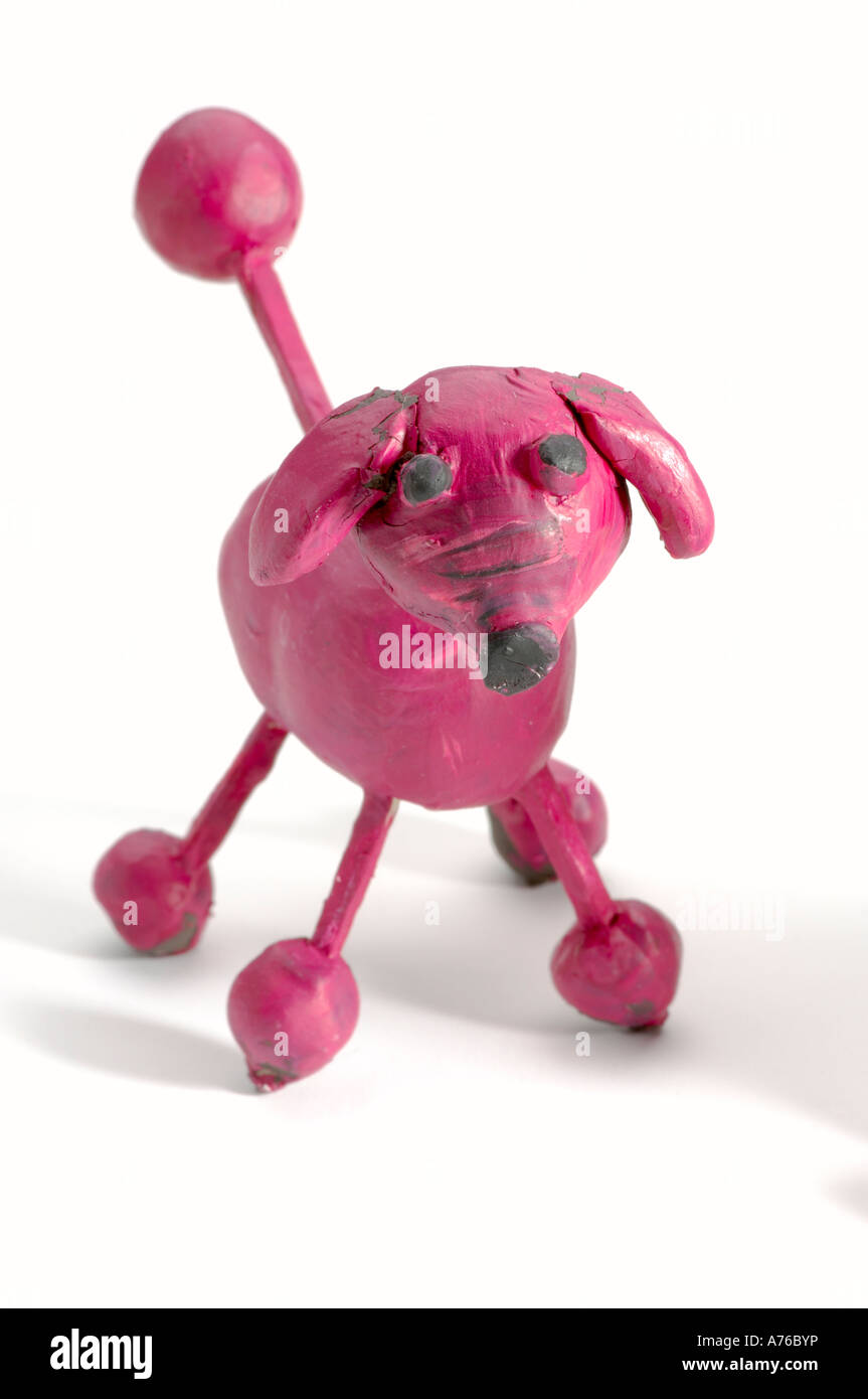 Pink Plasticine dog with matchstick legs: A child's handcrafted ...