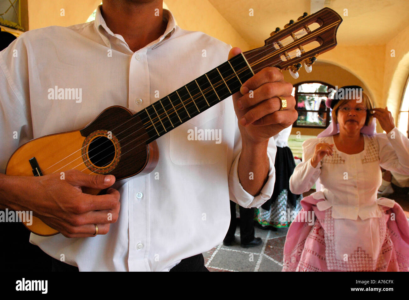 Timple guitar Traditional dance with dresses designed by artist Nestor ...