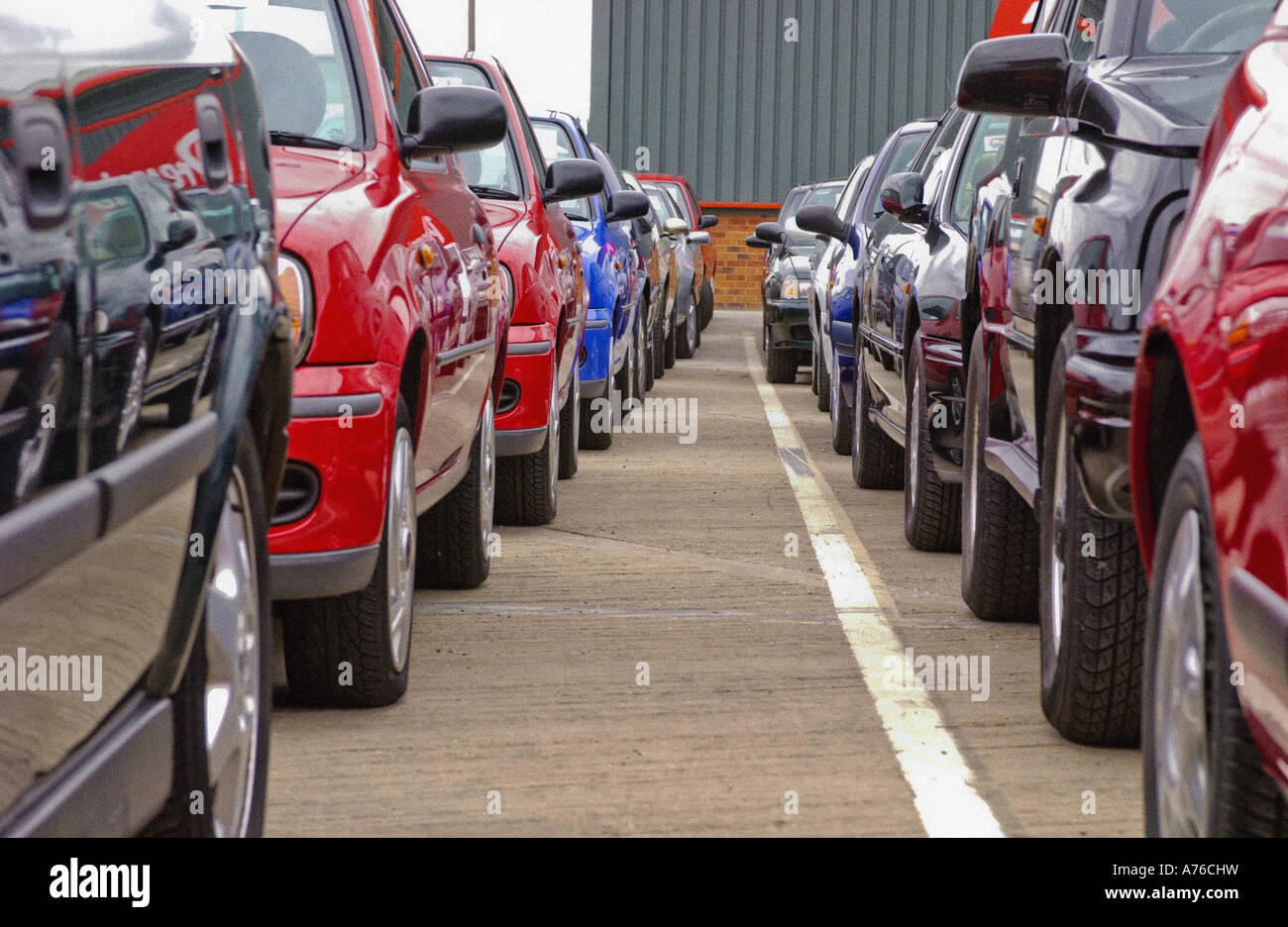 Lines of cars ready for sale at car auction Stock Photo - Alamy