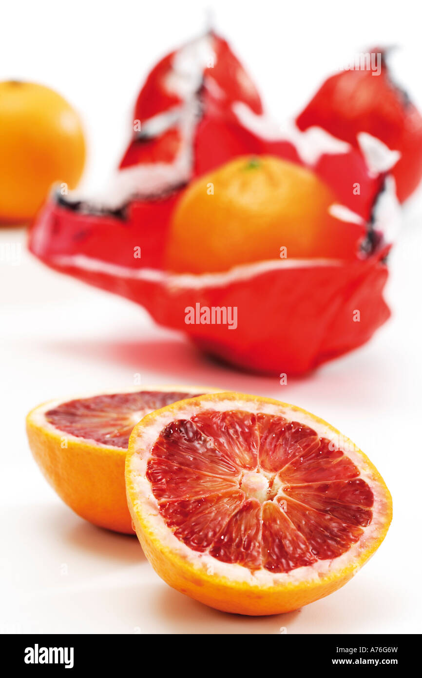 Blood orange in wrapping paper Stock Photo - Alamy