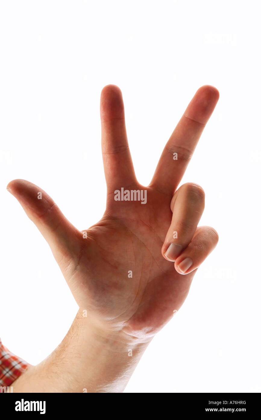 Hand showing three fingers close up hi-res stock photography and images ...
