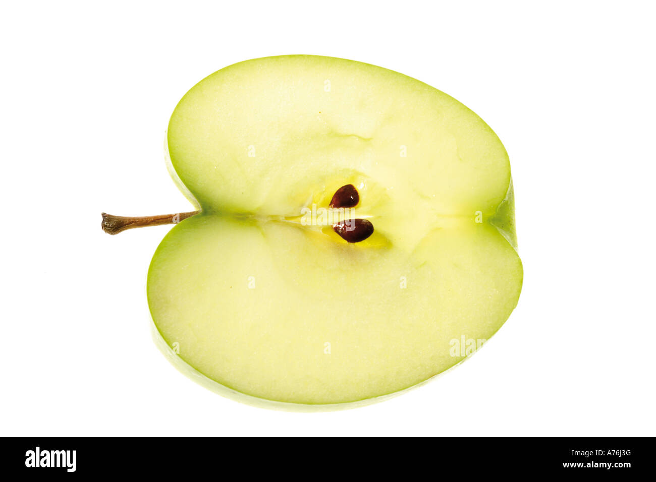 Apple sliced in half, close-up Stock Photo - Alamy