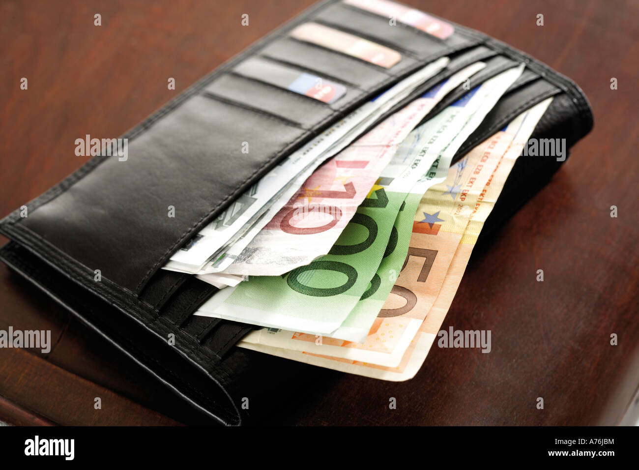 Wallet with euro banknotes, close-up Stock Photo - Alamy