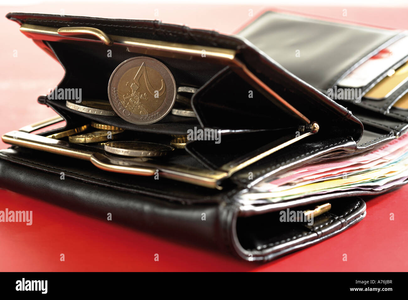 Wallet with euro banknotes, coins, close-up Stock Photo - Alamy