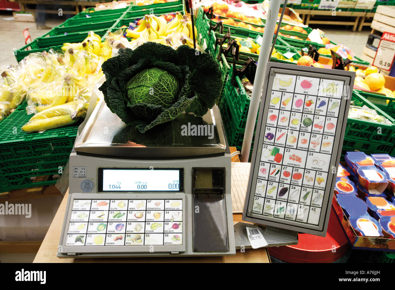 Savoy cabbage on supermarket scale Stock Photo - Alamy