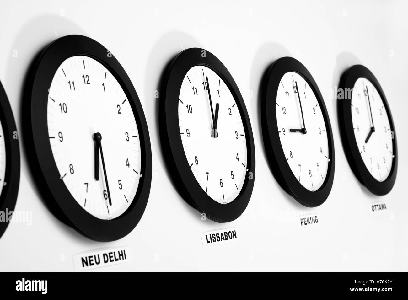 Clocks on wall, symbol for Greenwich Mean Time Stock Photo - Alamy