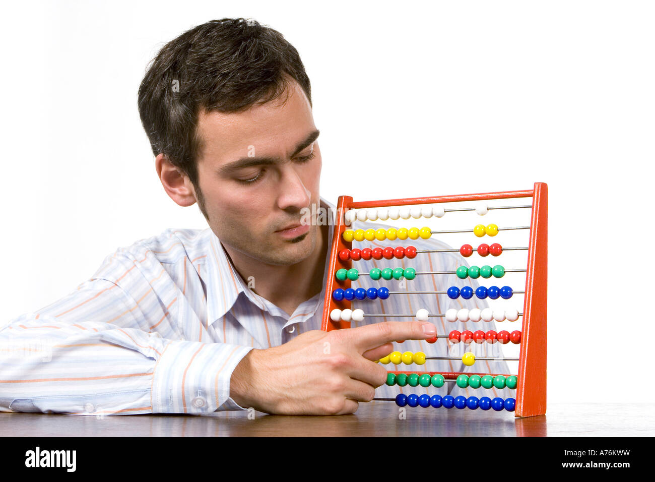 Young man working with abacus Stock Photo - Alamy
