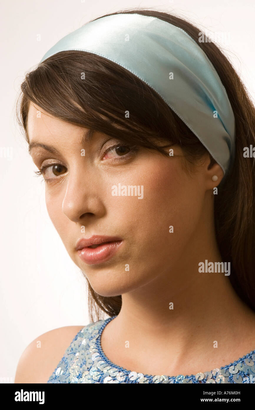 Young woman wearing hair band, portrait, close-up Stock Photo - Alamy