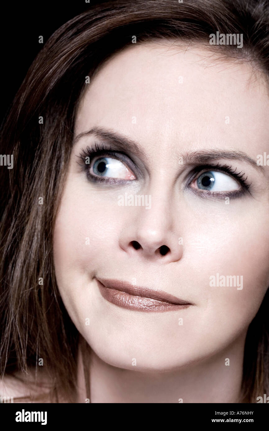 Young woman grimacing, portrait Stock Photo - Alamy
