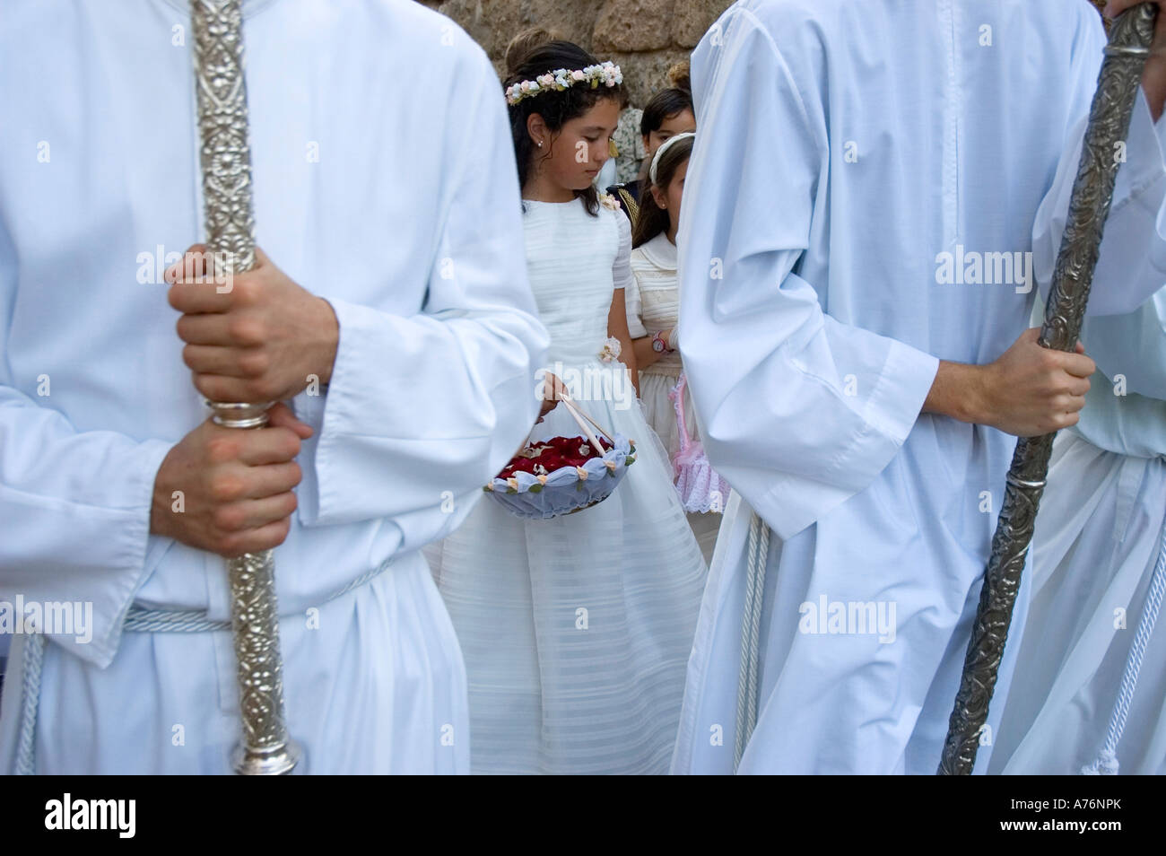 Girls wearing their communion dresses in Corpus Christi procession ...