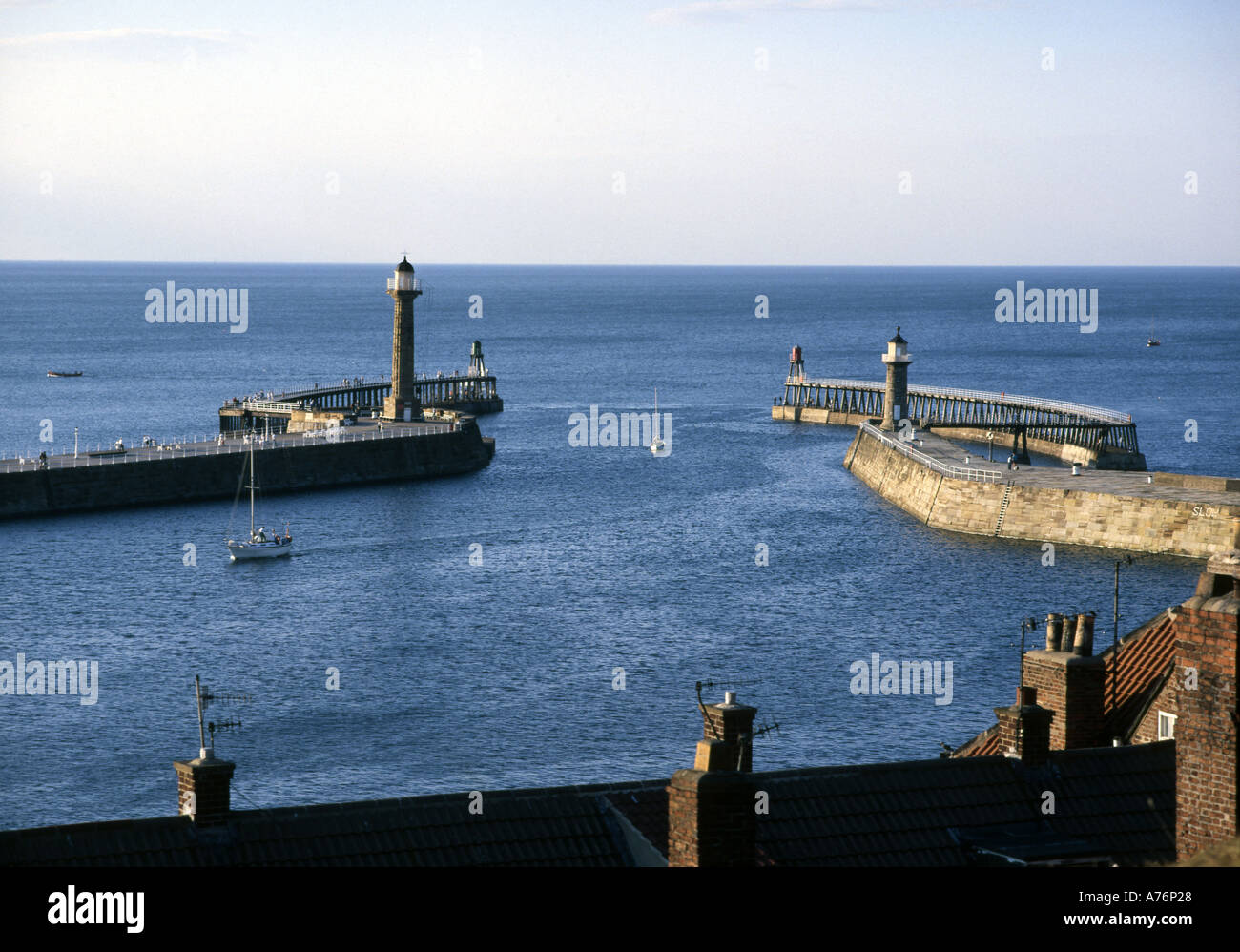 Whitby harbour entrance showing twin piers from Abbey cliff top Stock ...