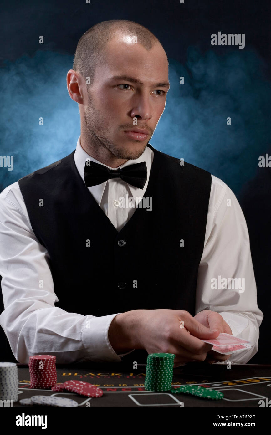 Well dressed men playing cards hi-res stock photography and images - Alamy