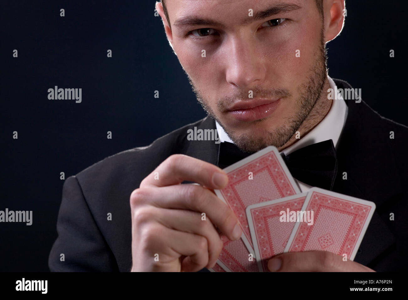 Well dressed men playing cards hi-res stock photography and images - Alamy