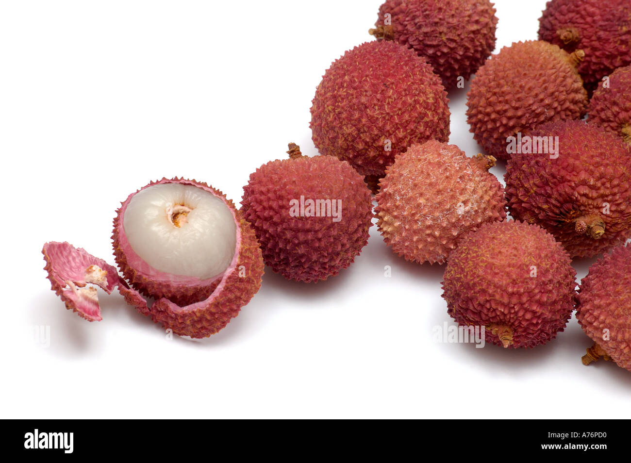 Tropical Lychee fruit with one peeled on white background Stock Photo ...