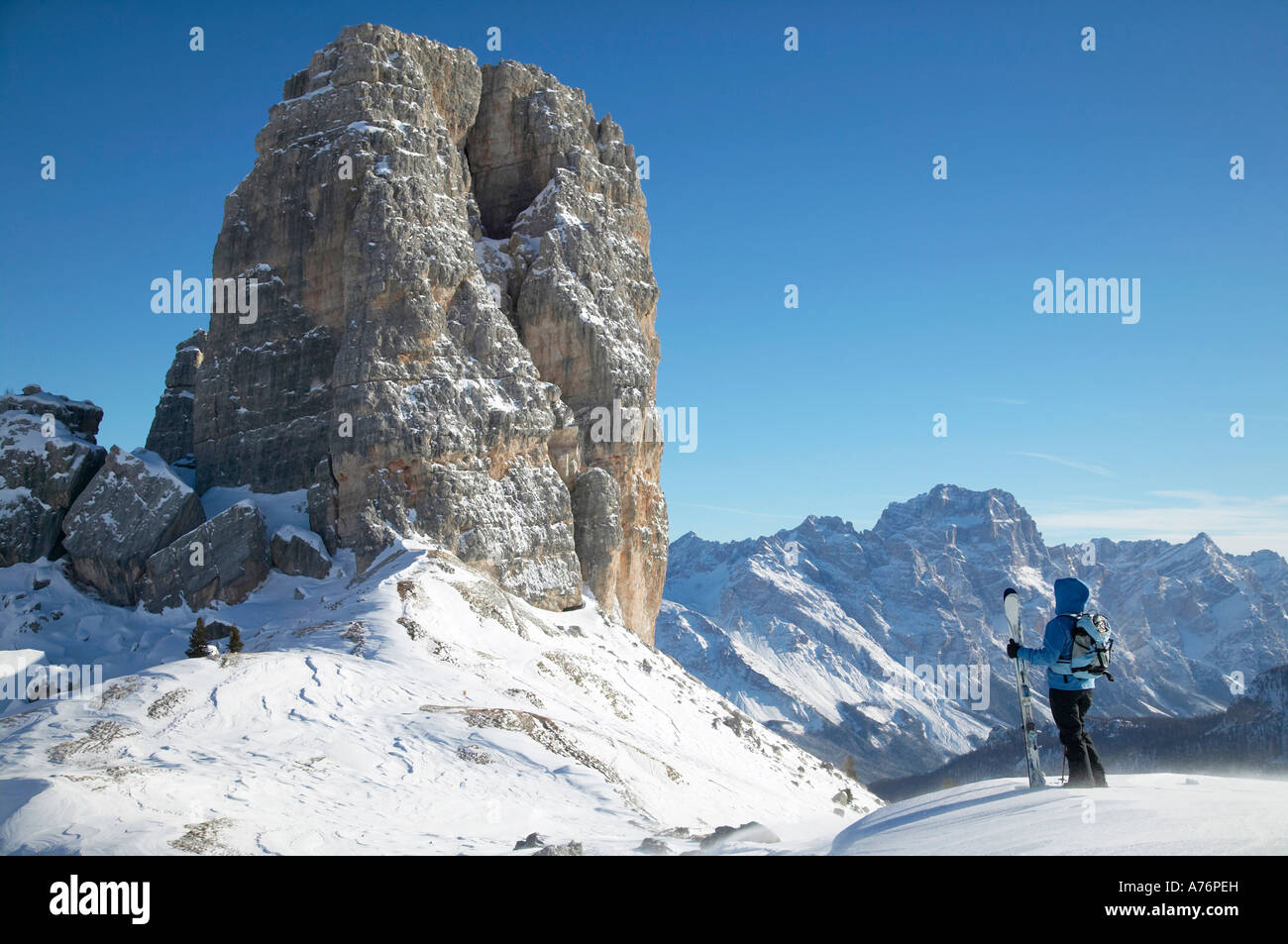 Italy, Dolomite alps, woman in snow, rear view Stock Photo - Alamy