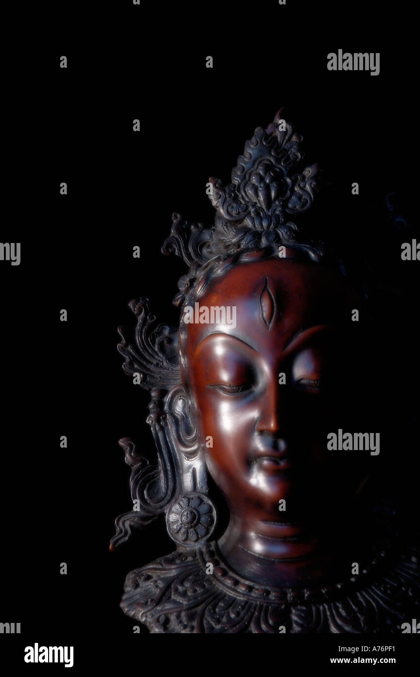 Bone carved Lord Shiva bust from Nepal on black background Stock Photo ...