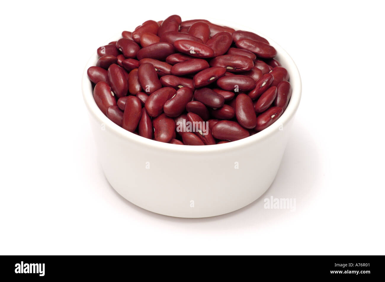 Red kidney beans on white background Stock Photo - Alamy