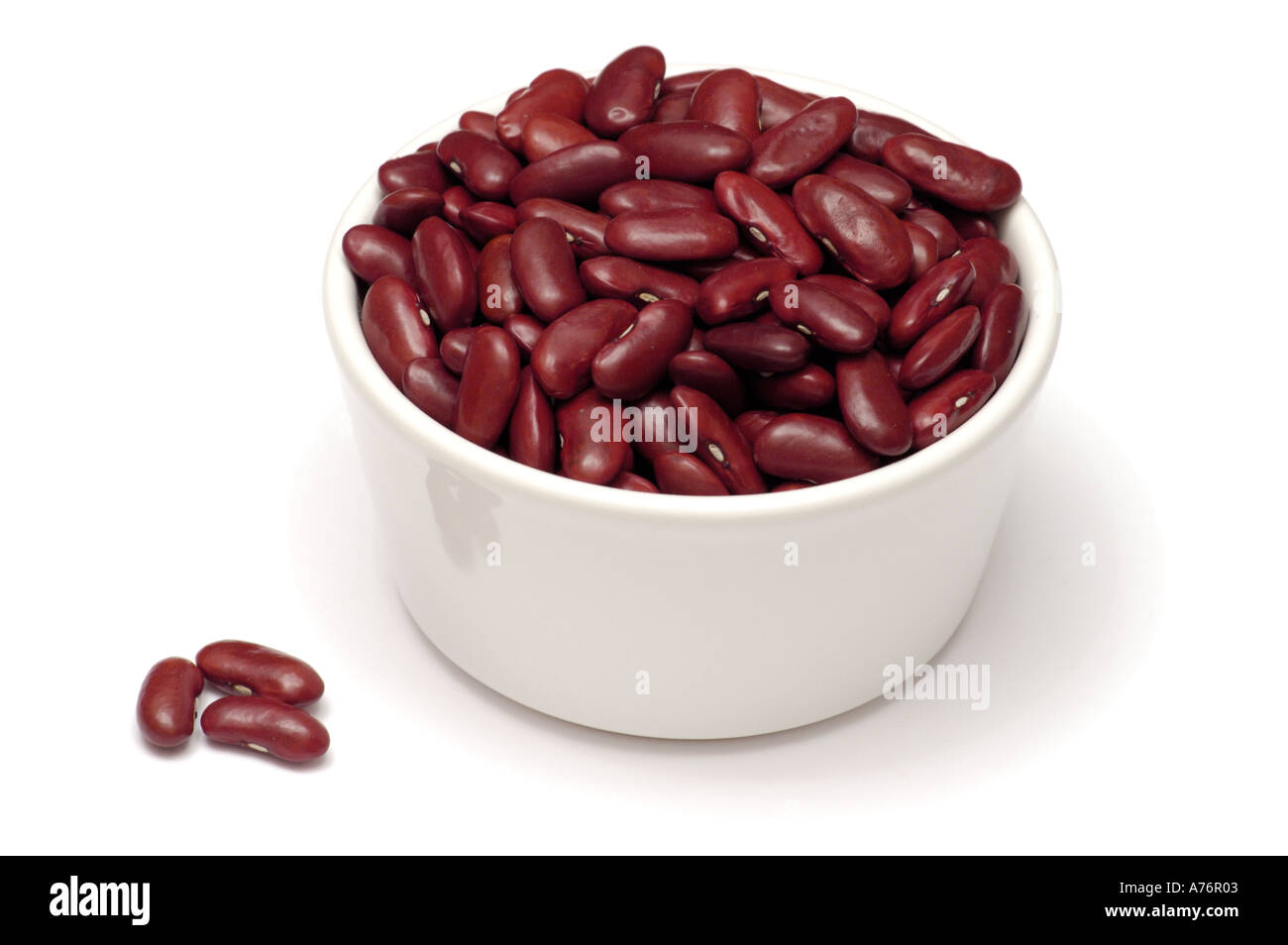 Red kidney beans on white background Stock Photo - Alamy