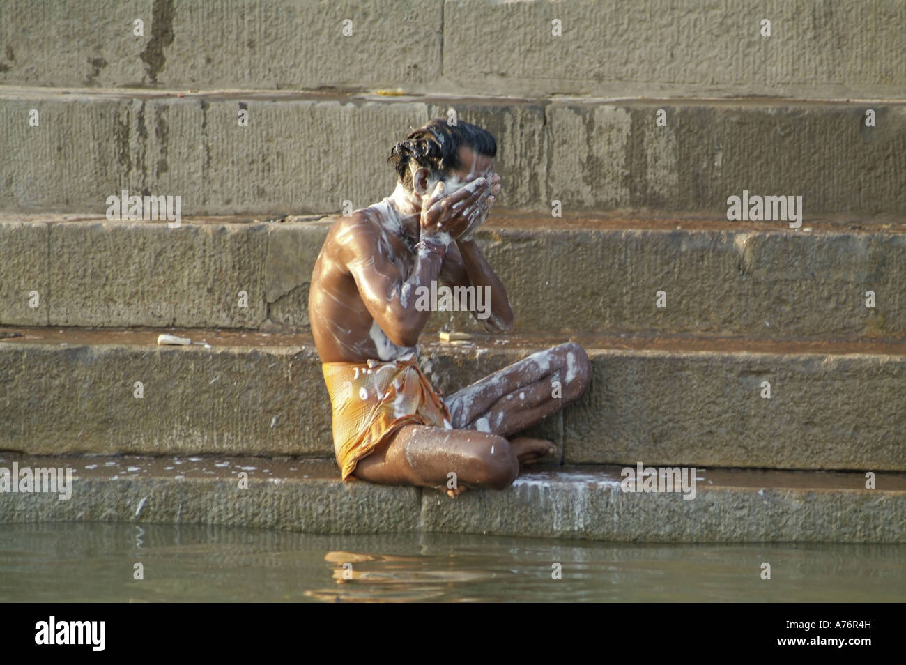 Man bathing in the Ganges River in Varanasi, India Stock Photo - Alamy
