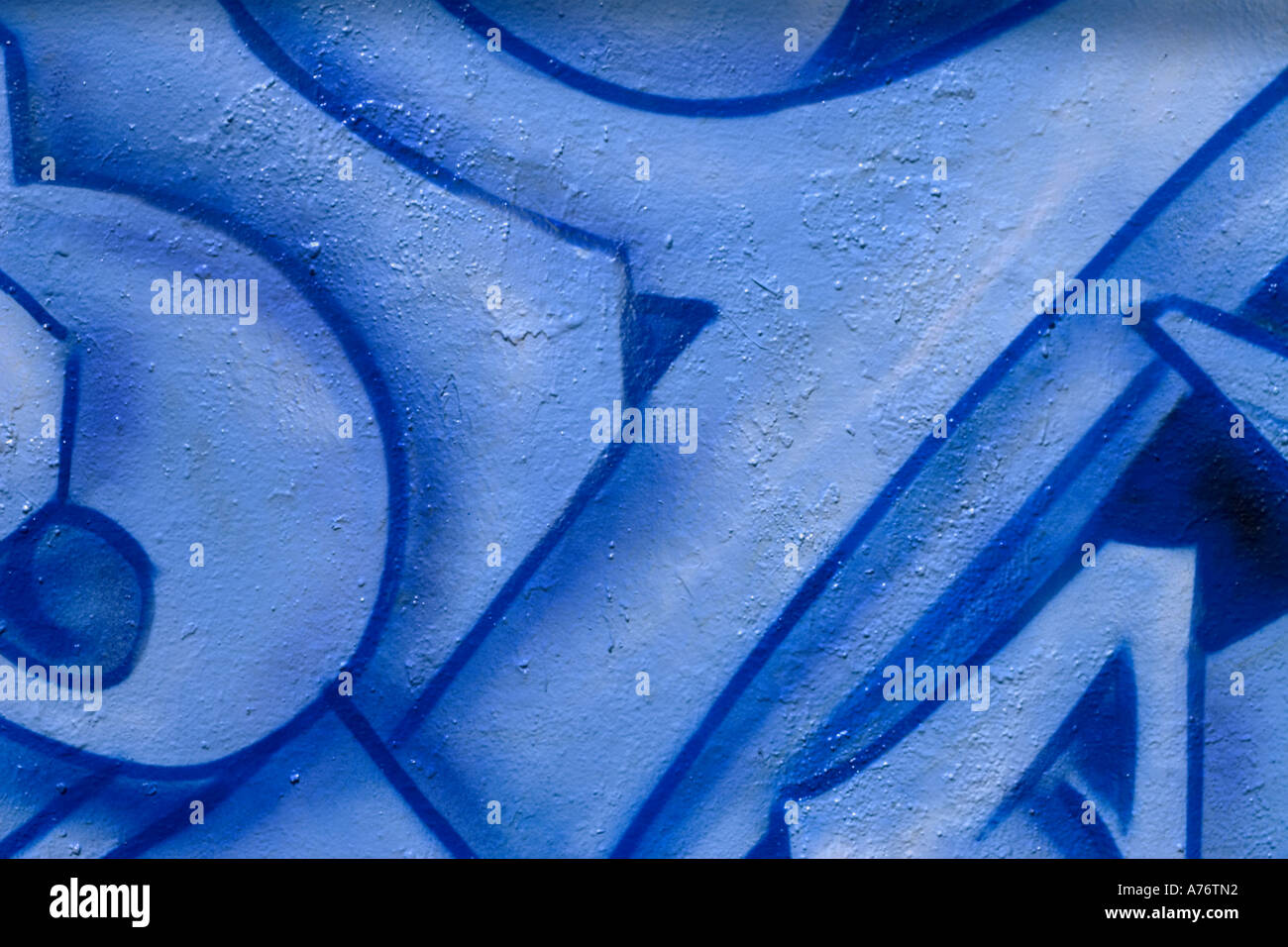 Wall painting blue blue plaster wall covered in street art and graffiti ...