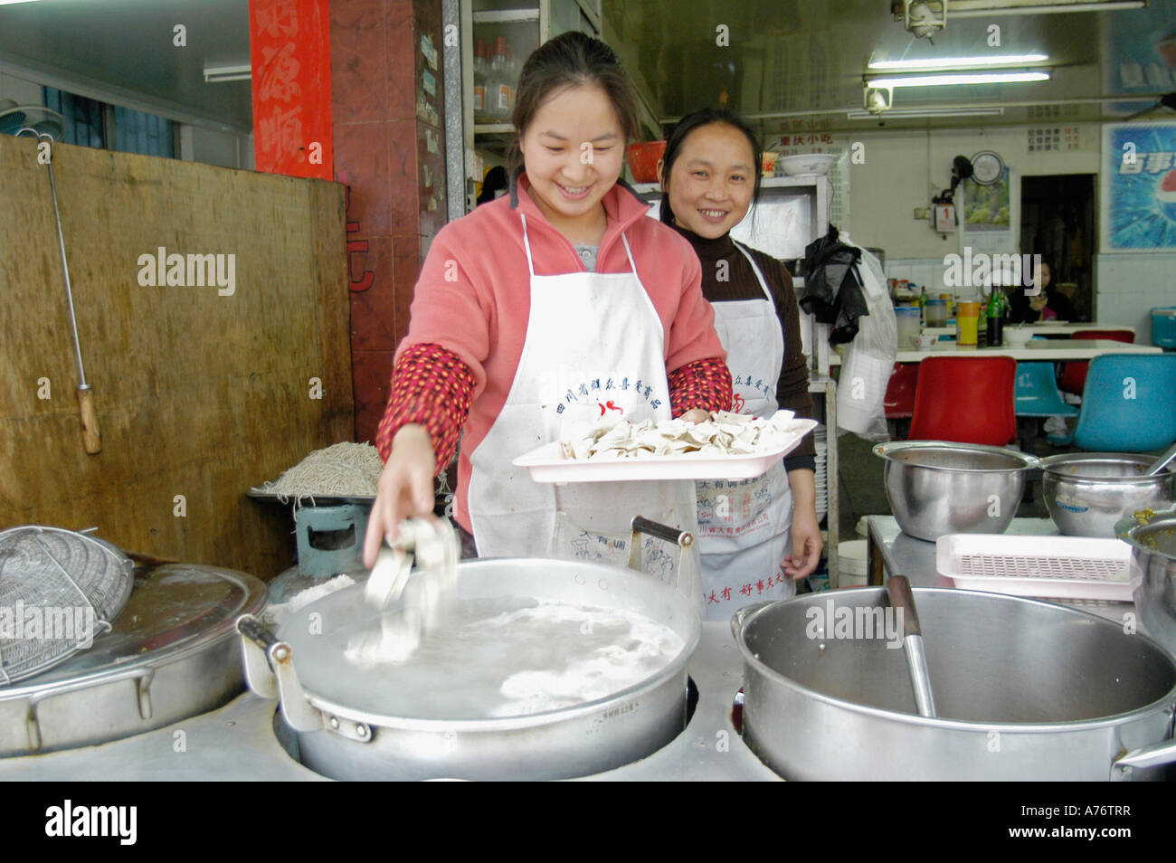 Friendly female cooks in a noodle kitchen, China Stock Photo - Alamy