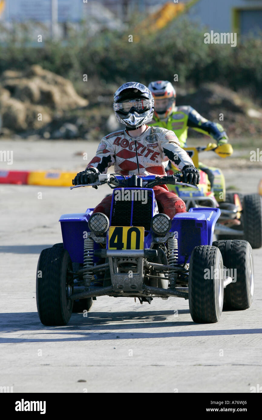 two quad racers racing on their bikes at the Motorcycle and Karting ...