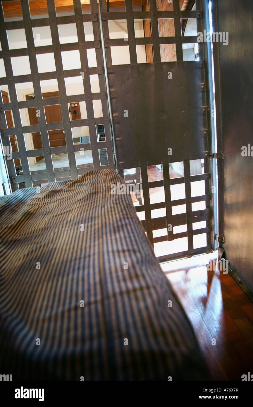 Old fashioned jailhouse cell Stock Photo - Alamy