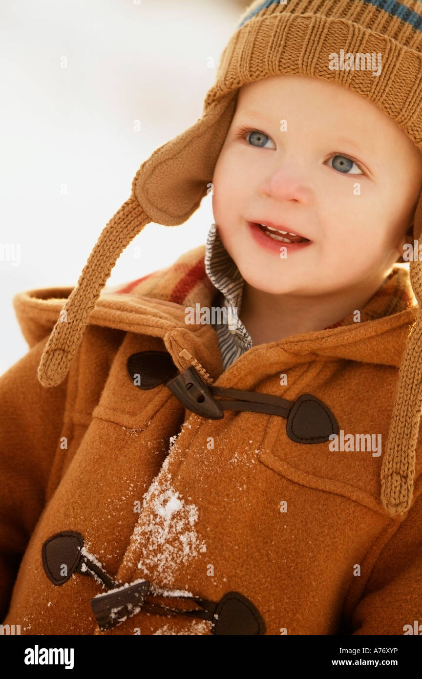 Boy wearing winter clothing Stock Photo - Alamy