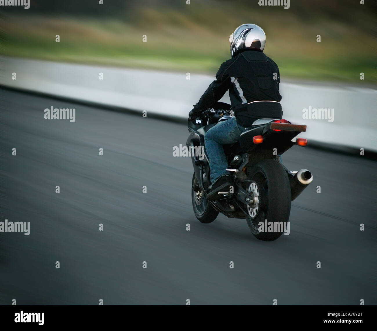 Person riding a motorcycle Stock Photo - Alamy