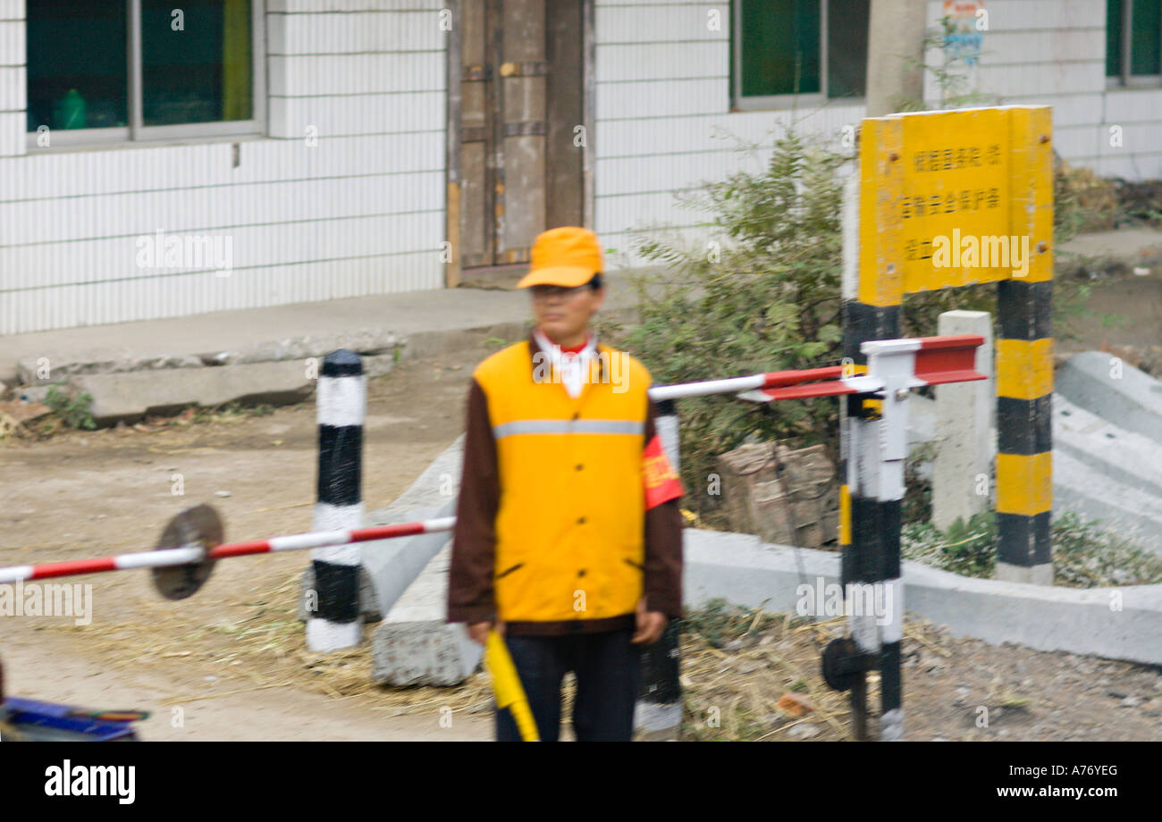 CHINA SHANGHAI Chinese railroad worker stops traffic at a rural railway ...