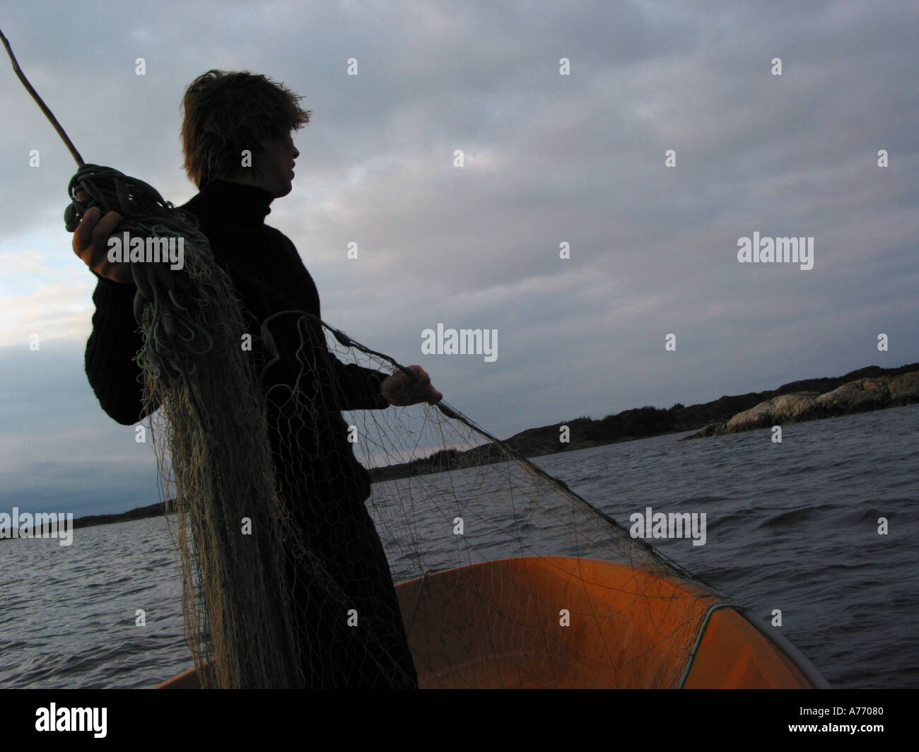 Fishing with net Stock Photo - Alamy