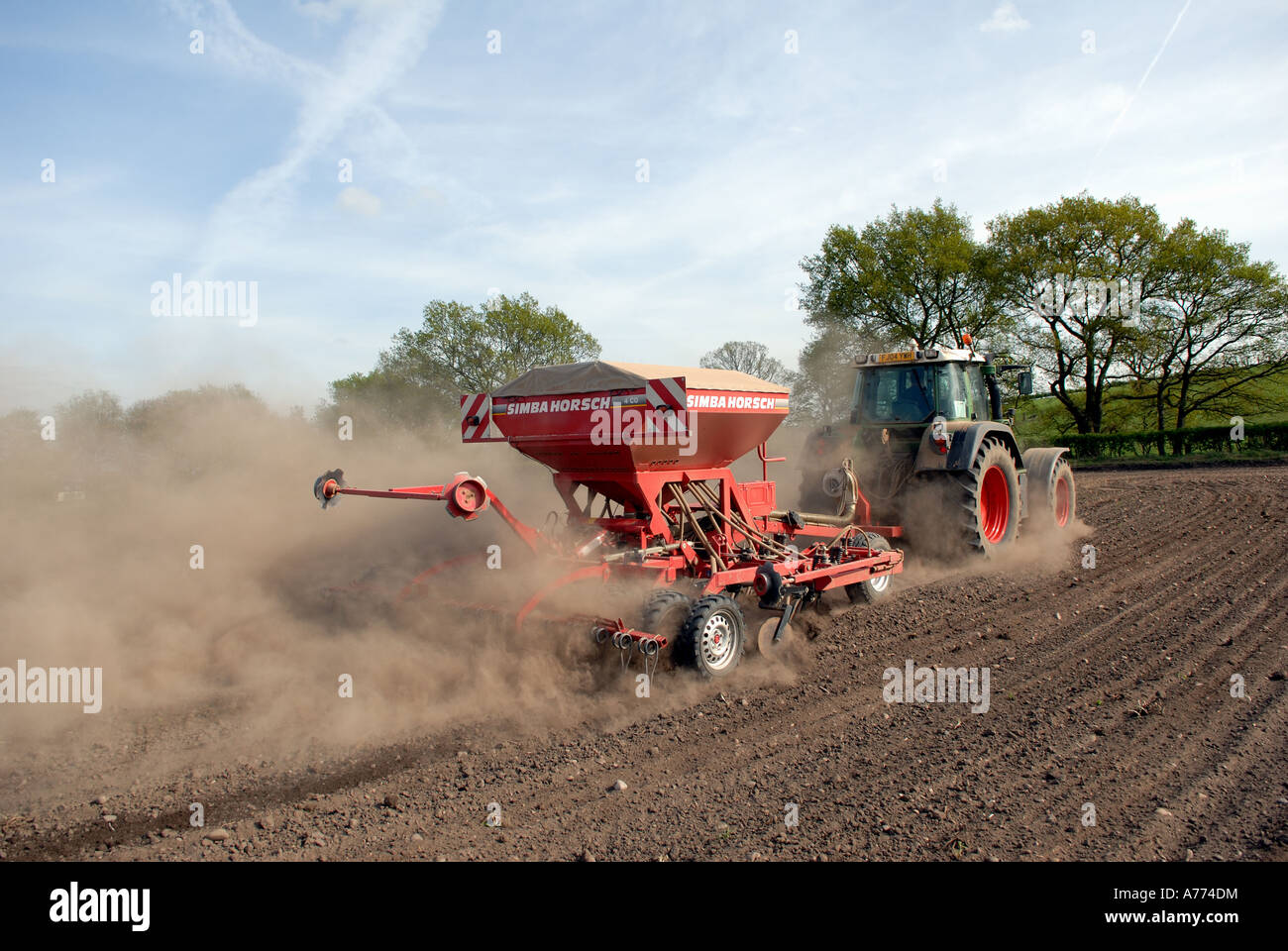 Tractor and drilling machine Stock Photo - Alamy