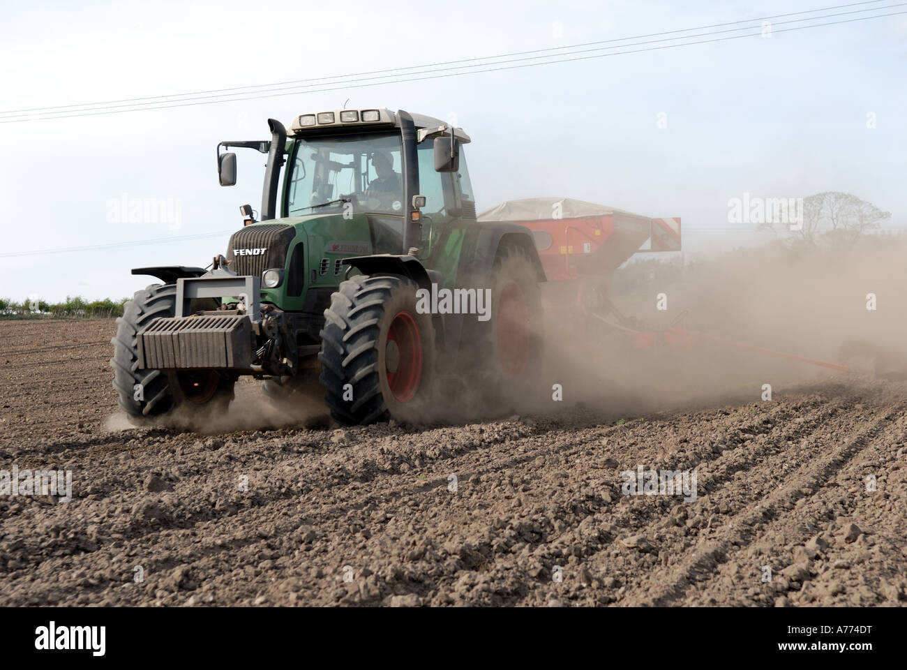 Planting seeds for new crop Stock Photo - Alamy
