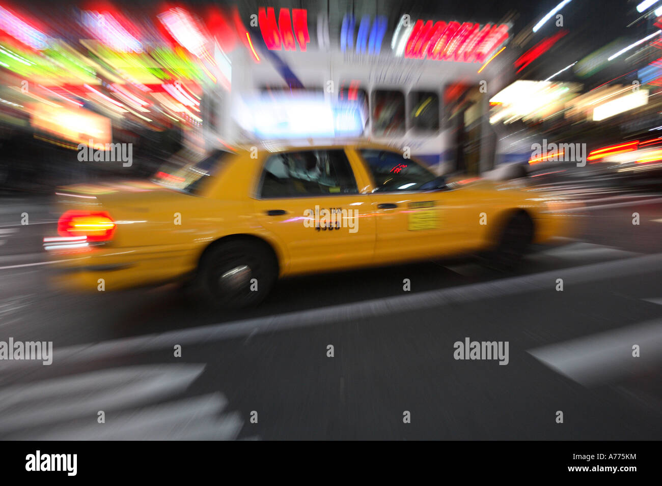 blurred yellow cab at evening in manhattan, new york city, usa Stock ...