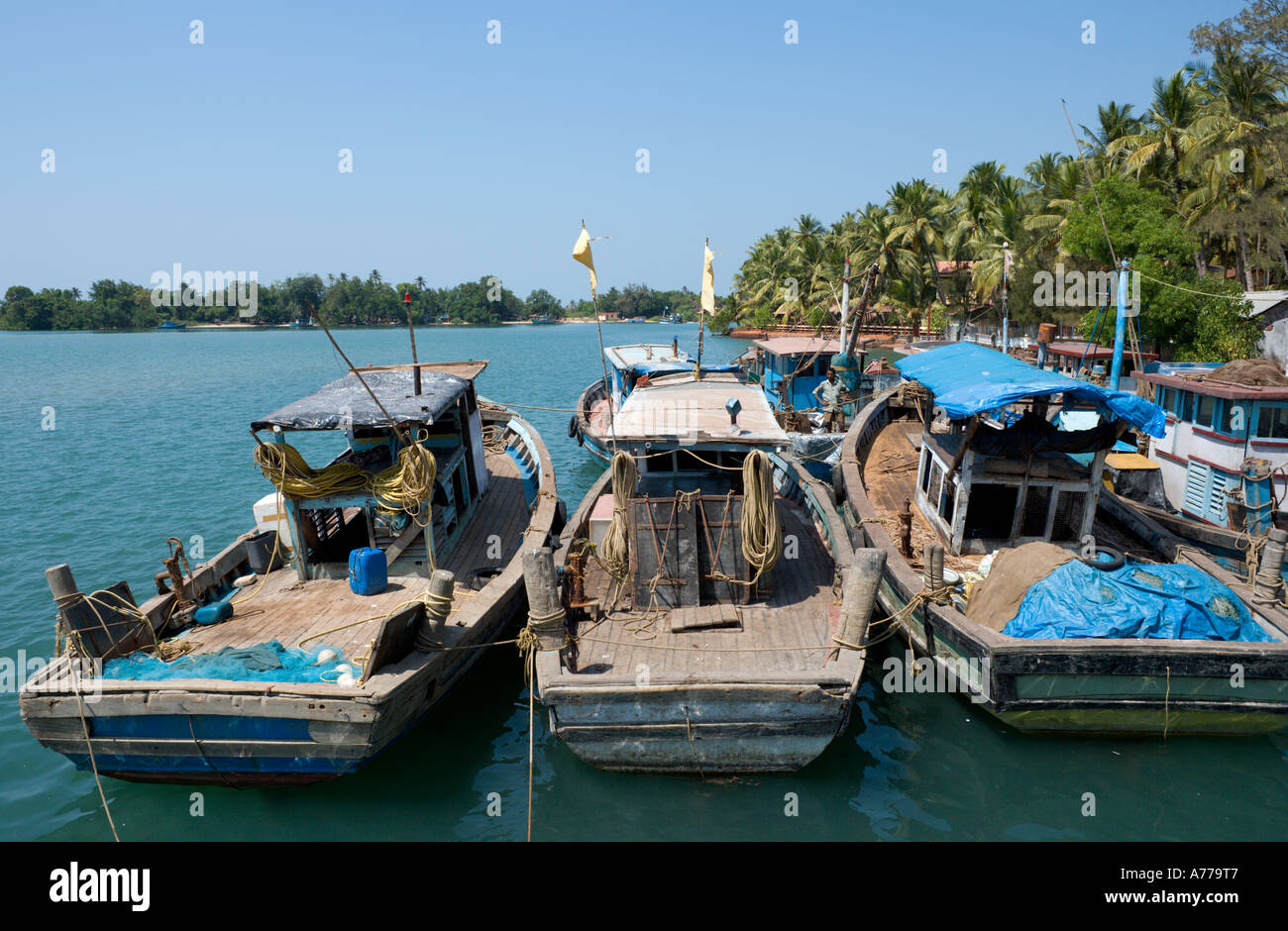 Fishing boats on the River Sal in the traditional fishing village of ...