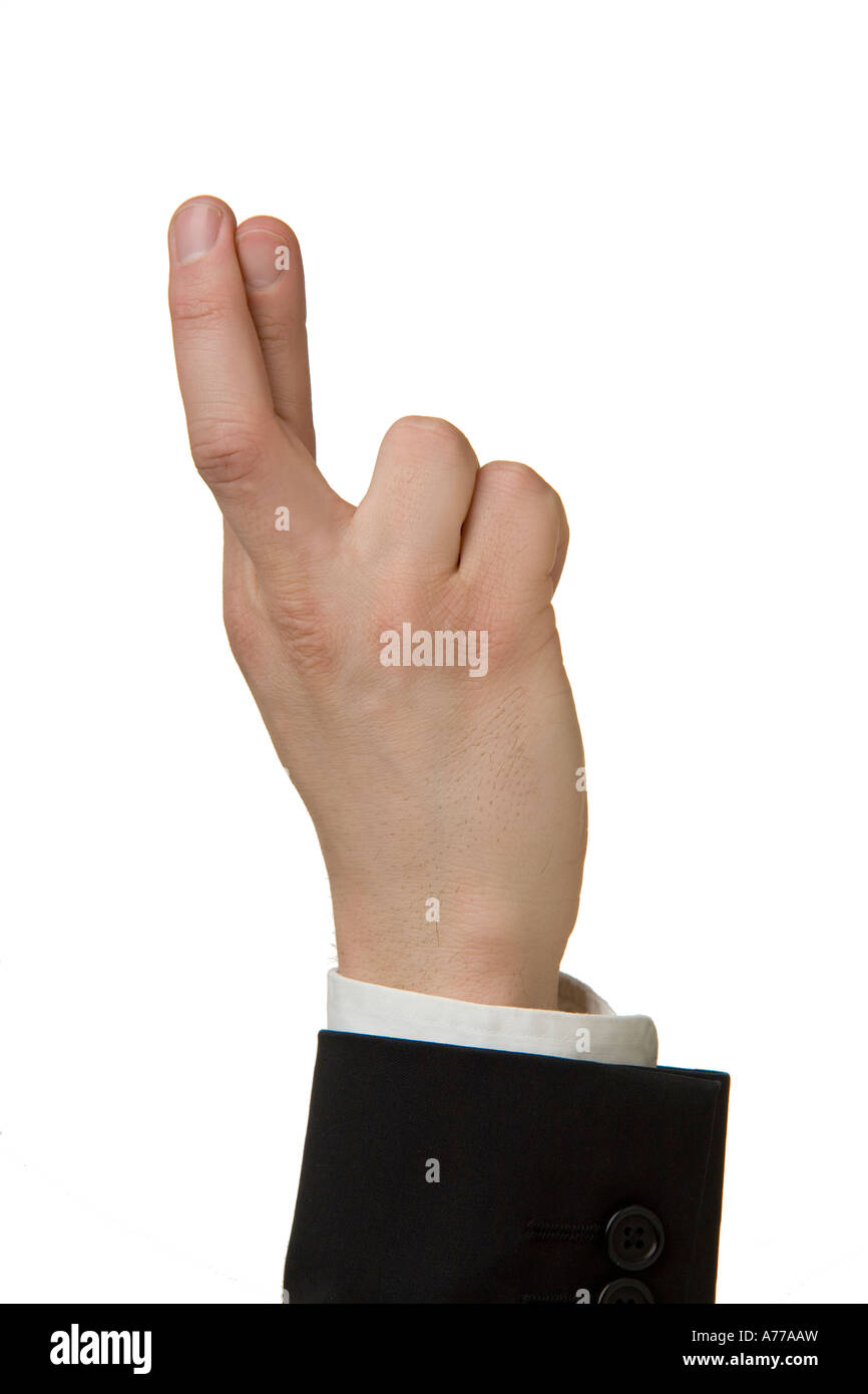 hand with crossed fingers Stock Photo - Alamy