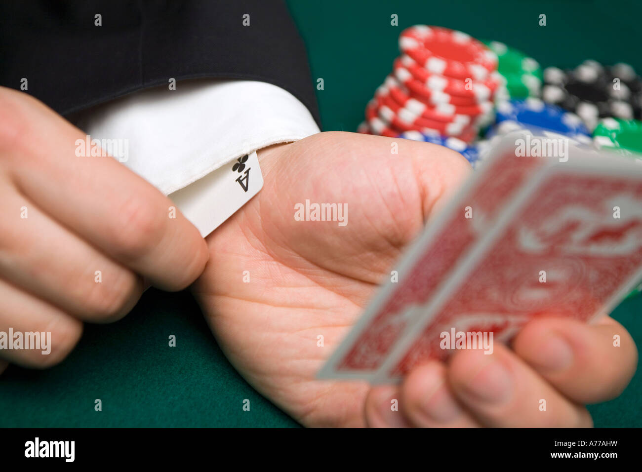 Cheating at cards Stock Photo - Alamy