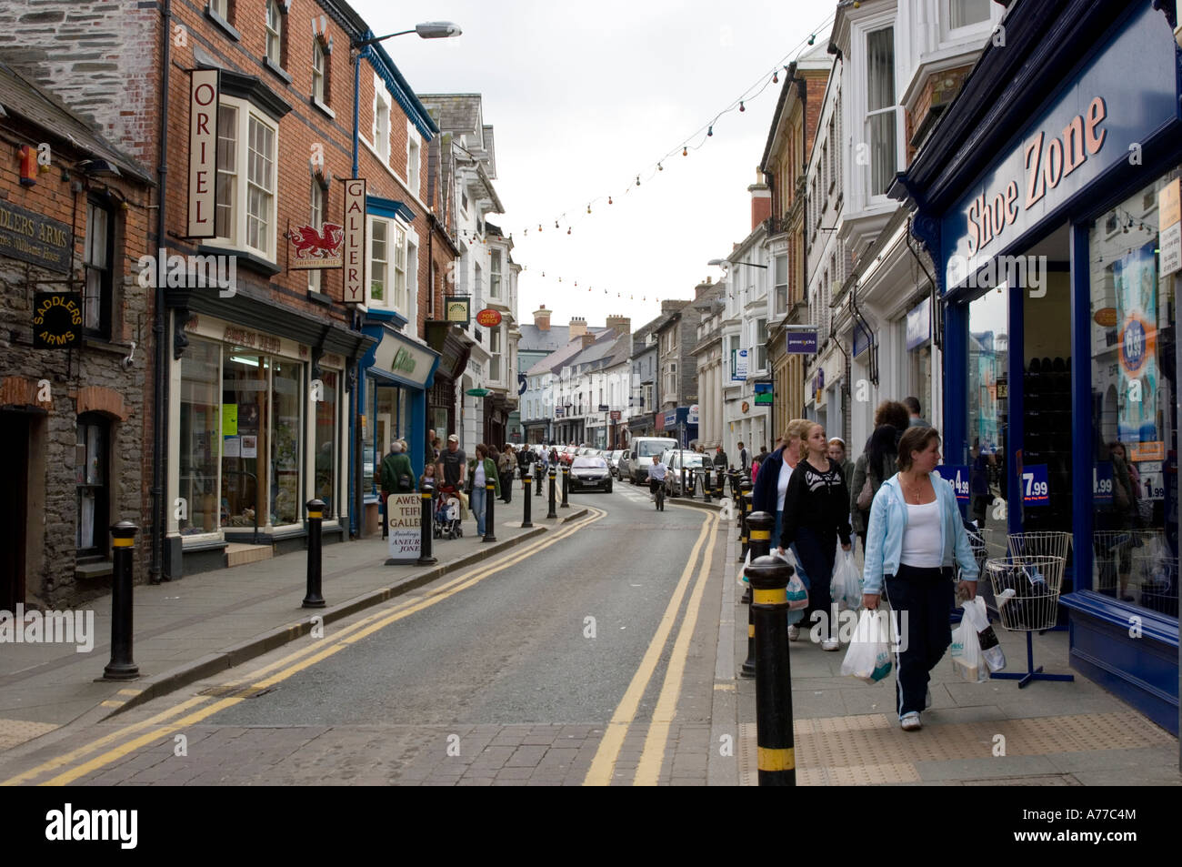 shoppers walking in Cardigan town centre Wales UK Stock Photo - Alamy
