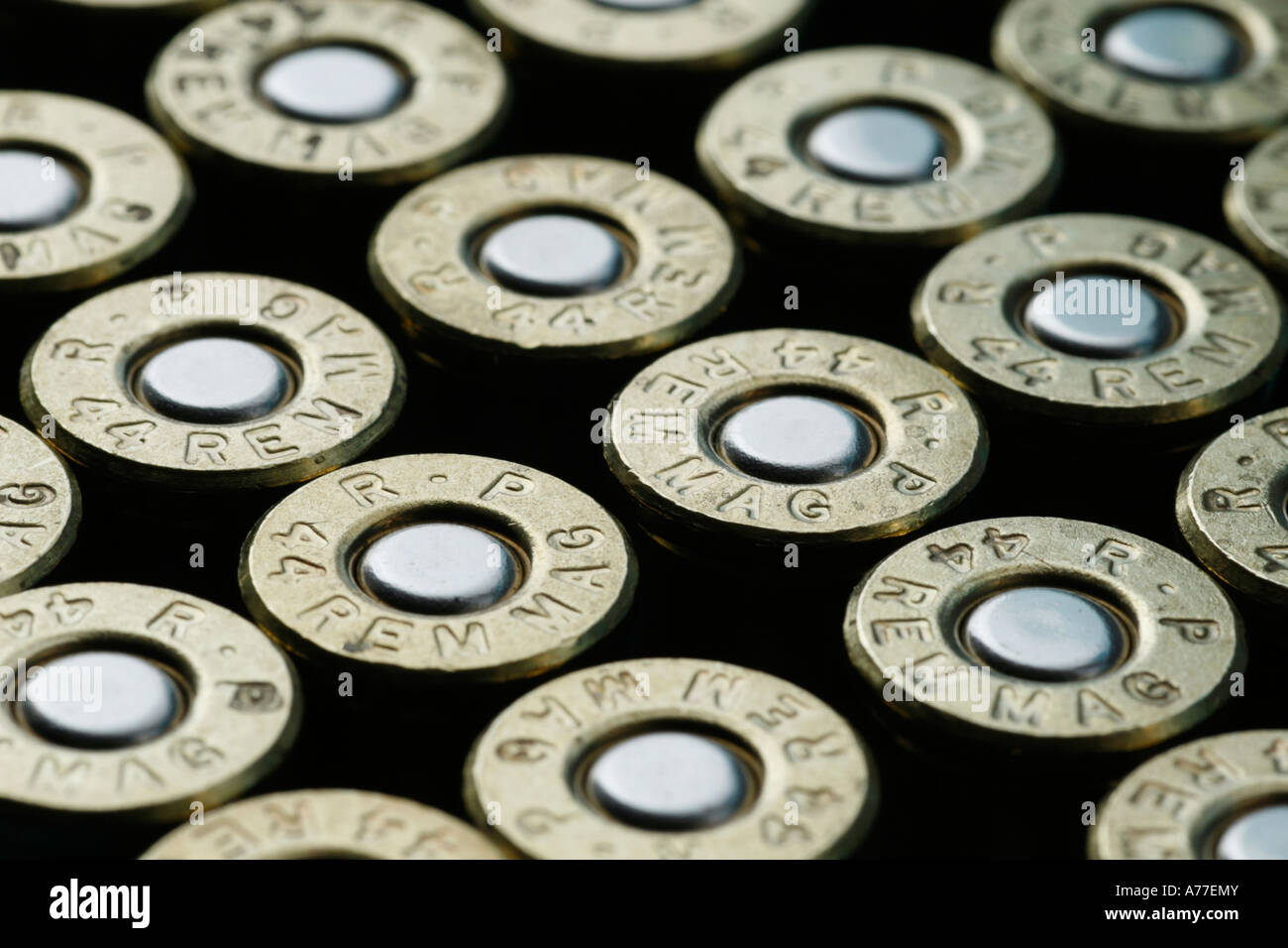 A close up image of live .44 magnum revolver rounds ready for firing ...