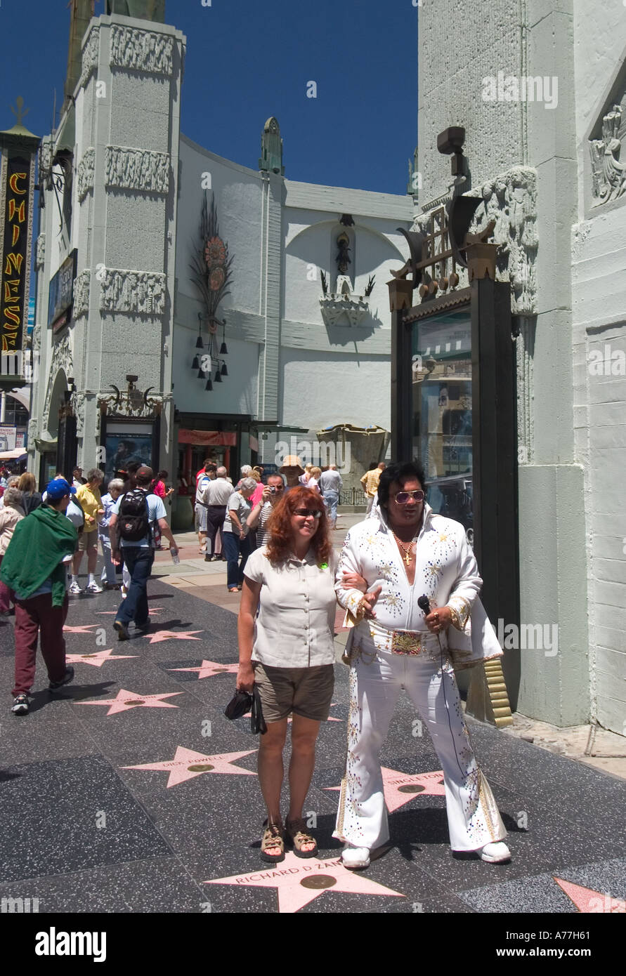 Elvis character posing with tourist on Hollywood Boulevard Stock Photo ...