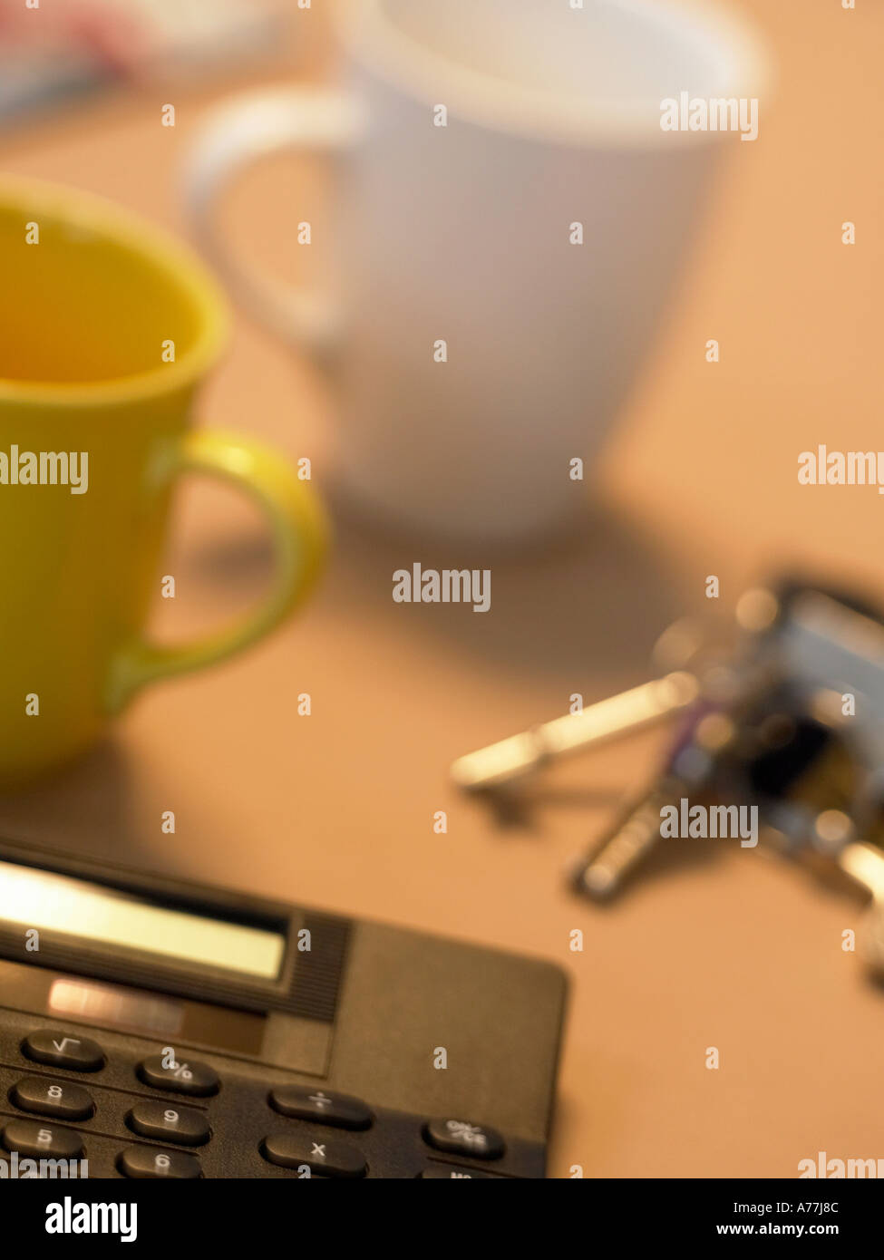 mugs on desk Stock Photo - Alamy