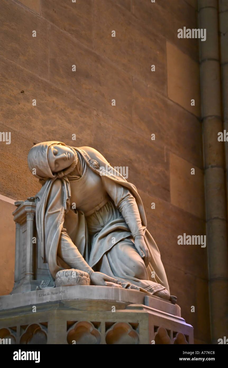 A statue of a robed woman inside the St Vitus Cathedral Prague Czech ...