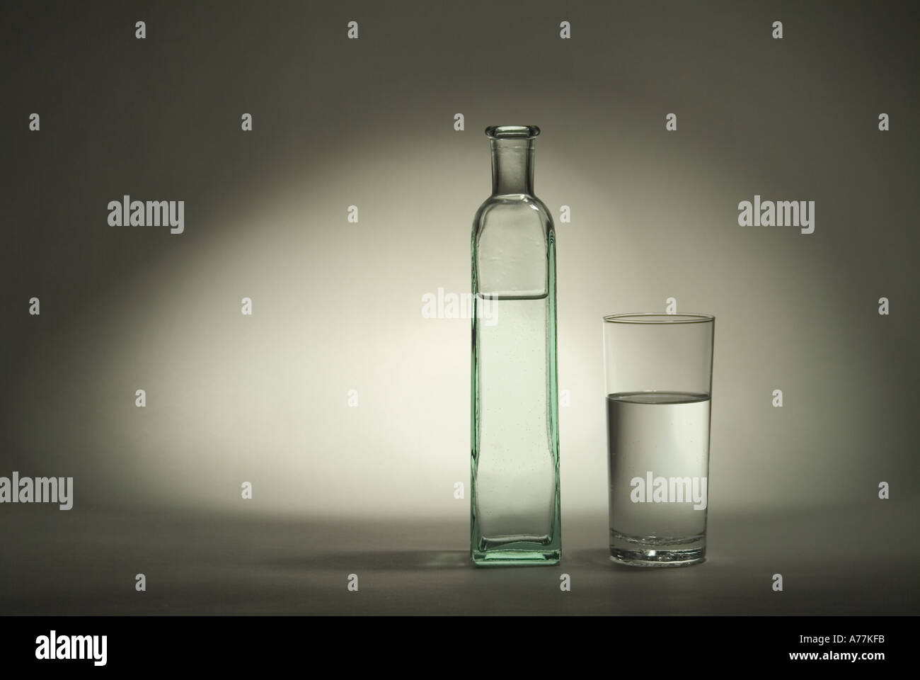 Bottle and glass of drinking water Stock Photo - Alamy