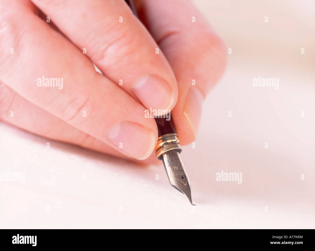HAND WITH A PEN SIGNATURE Stock Photo - Alamy