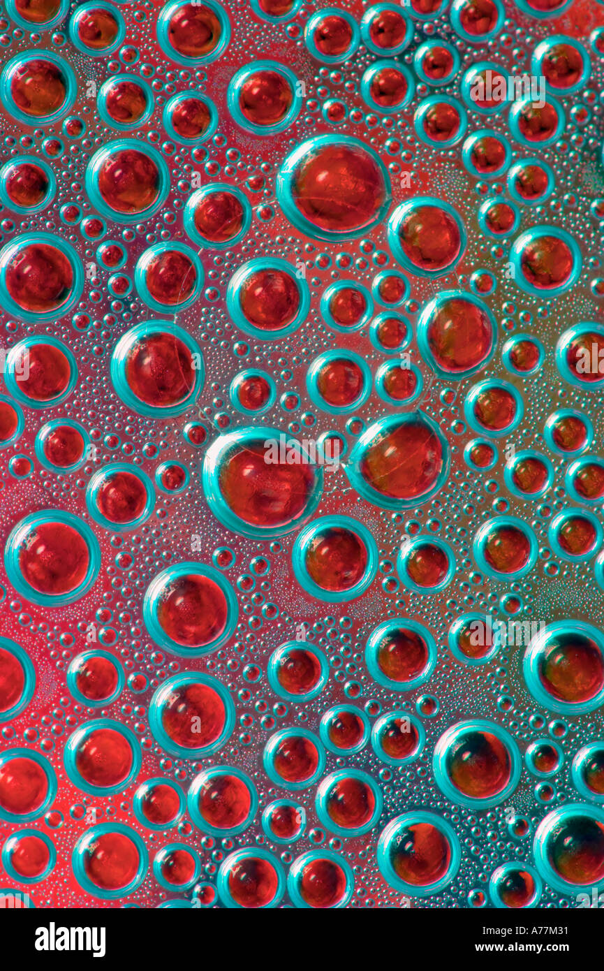 Colorful water condensation drops on a transparent surface Stock Photo ...