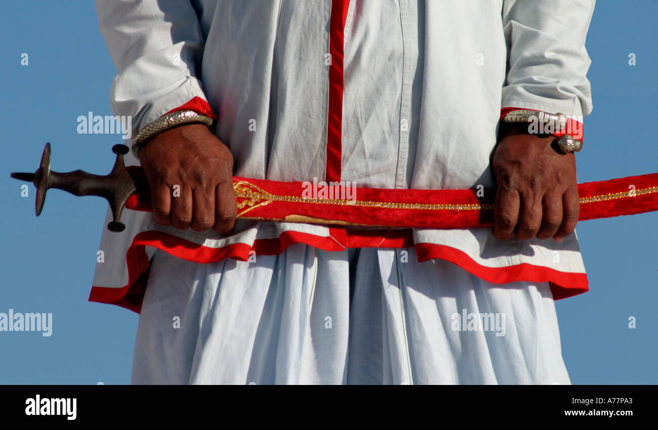 a man holds his sword in india Stock Photo - Alamy