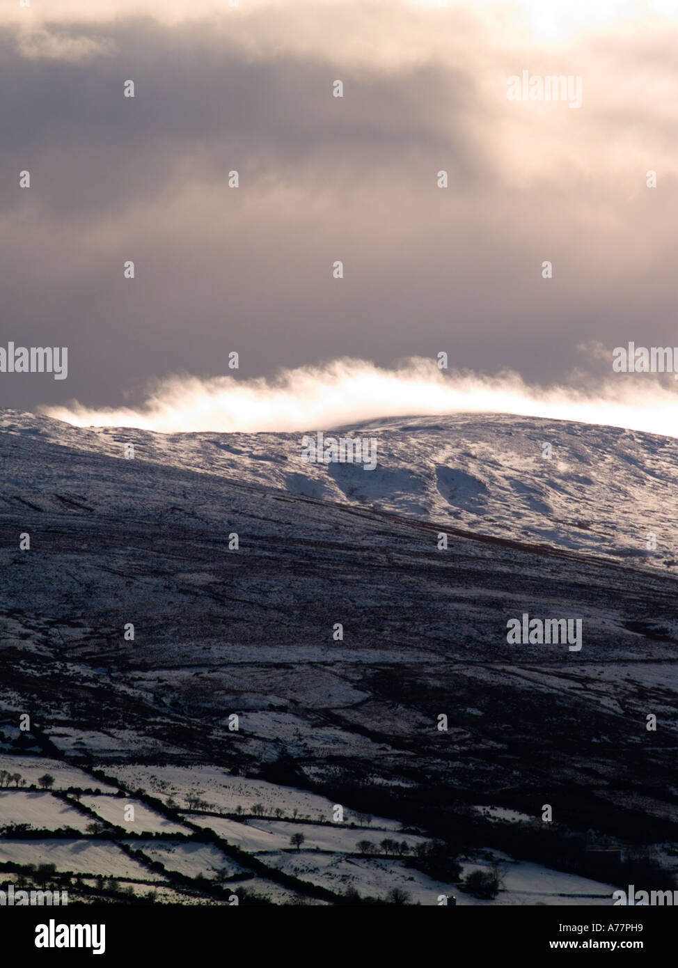 The rolling snow topped hills of the Sperrins mountain range Northern ...