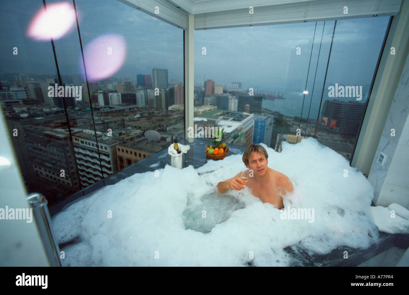 Man taking bath Hong Kong Stock Photo - Alamy