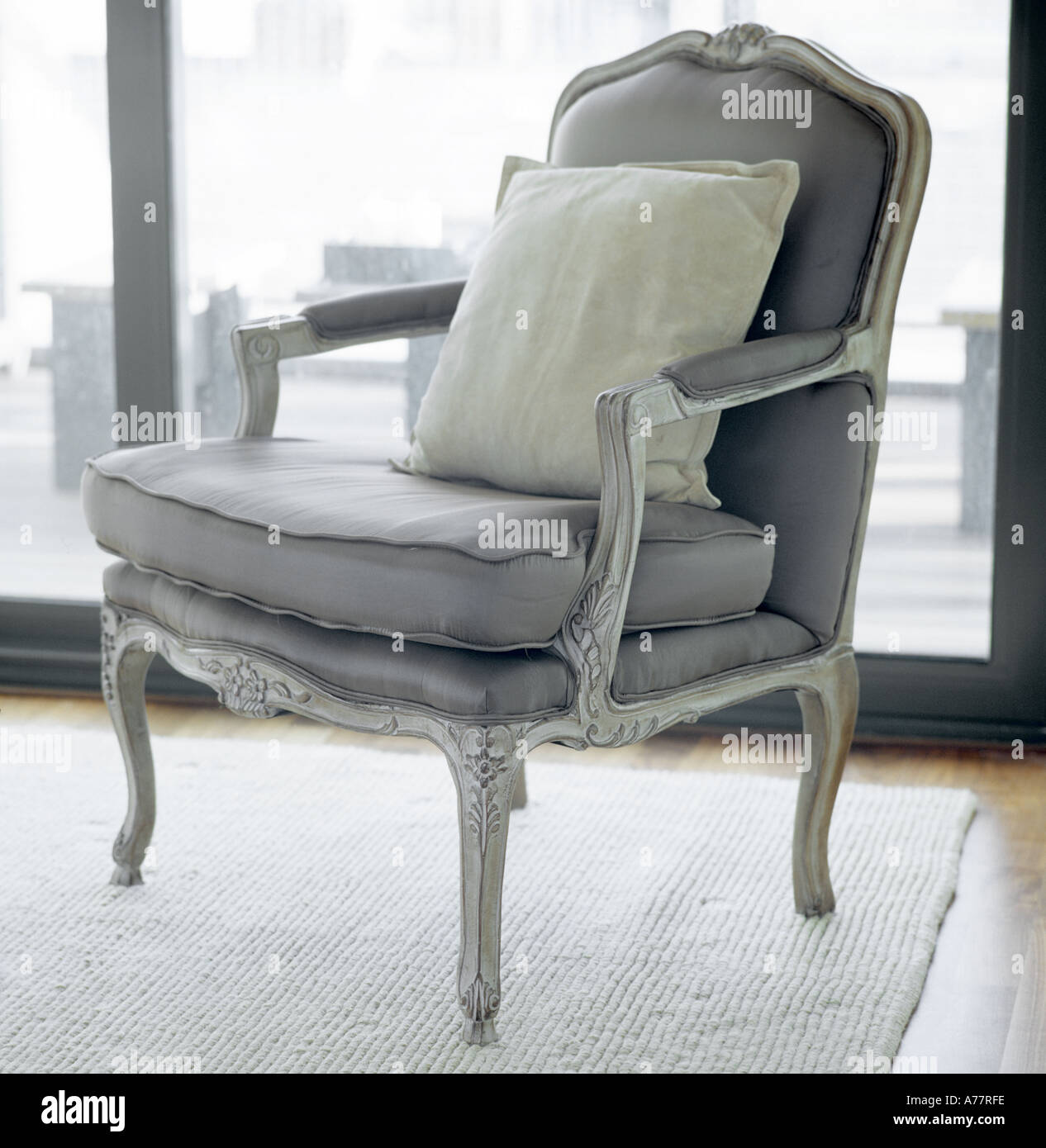 French style chair with grey upholstery Stock Photo - Alamy